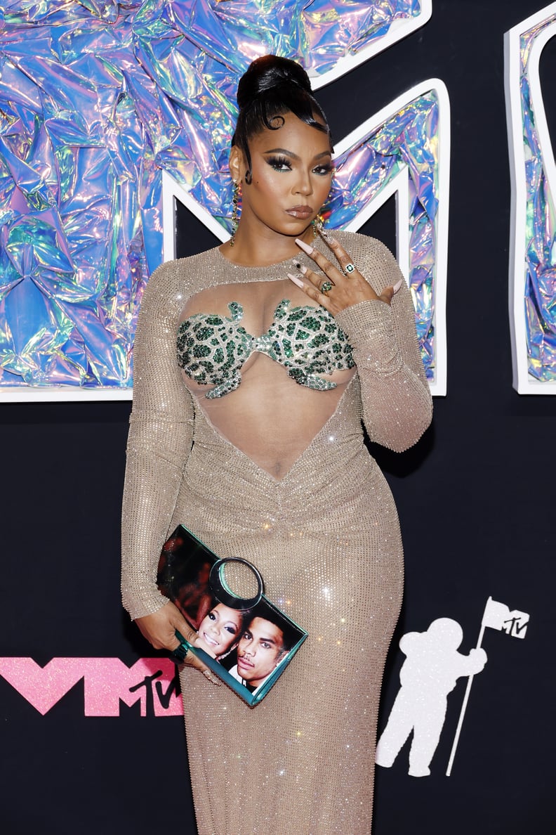 Ashanti's Clutch Features a Photo of Nelly at the VMAs | PS Fashion