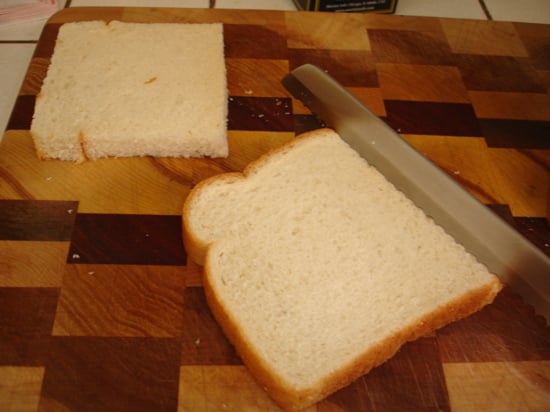 Cutting off the crusts | Benedictine Cheese Sandwiches Photo 9