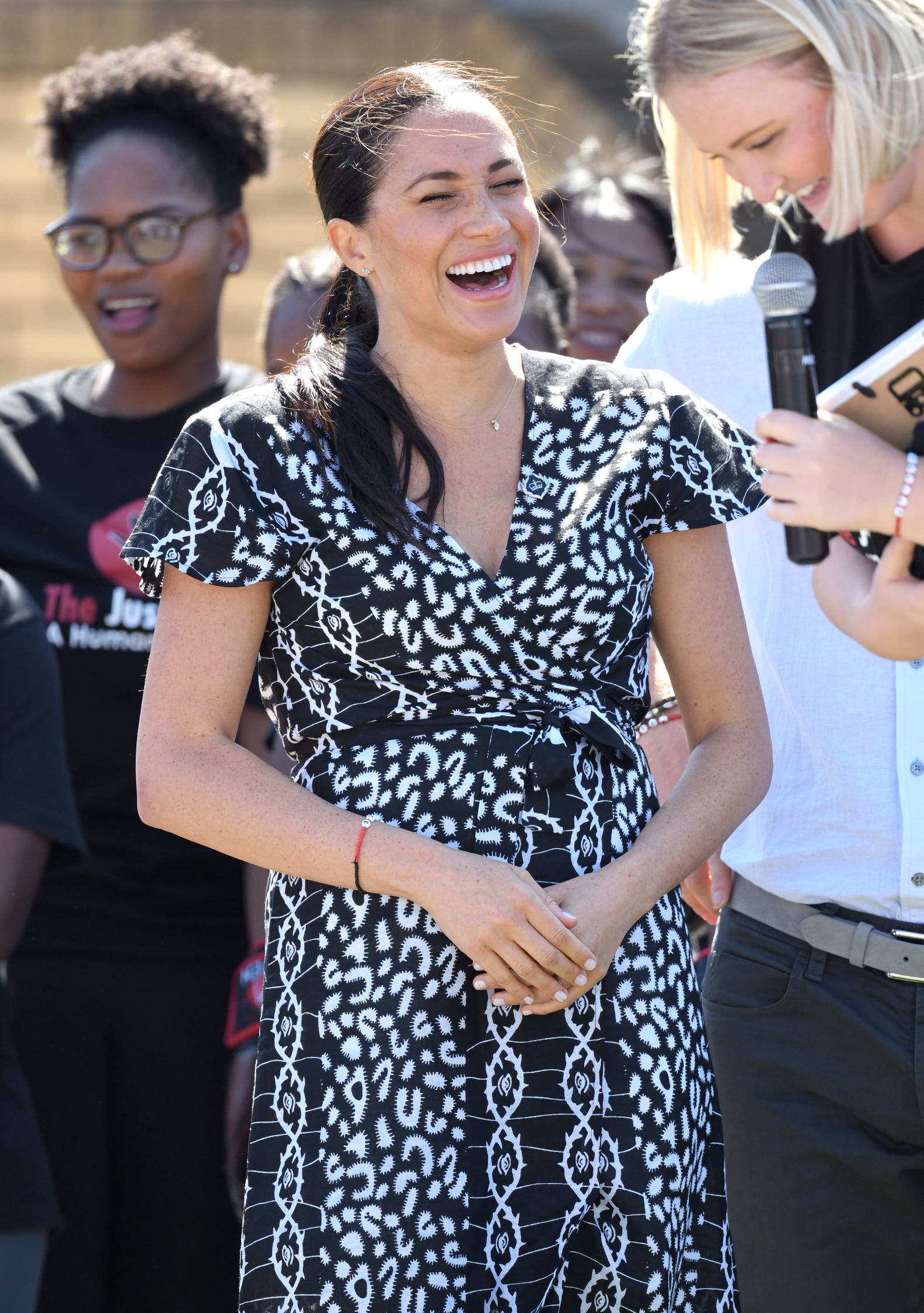 Pictures of Meghan Markle Laughing | PS Celebrity