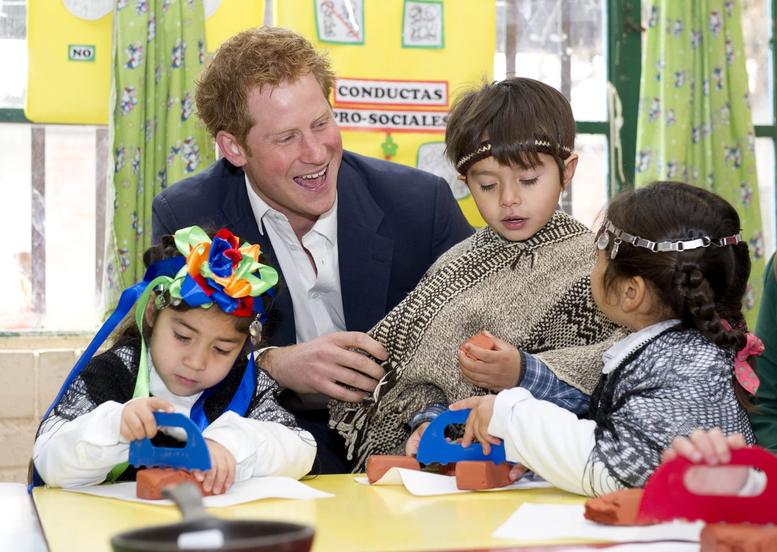 The Cutest Pictures of Prince Harry With Kids | PS Celebrity
