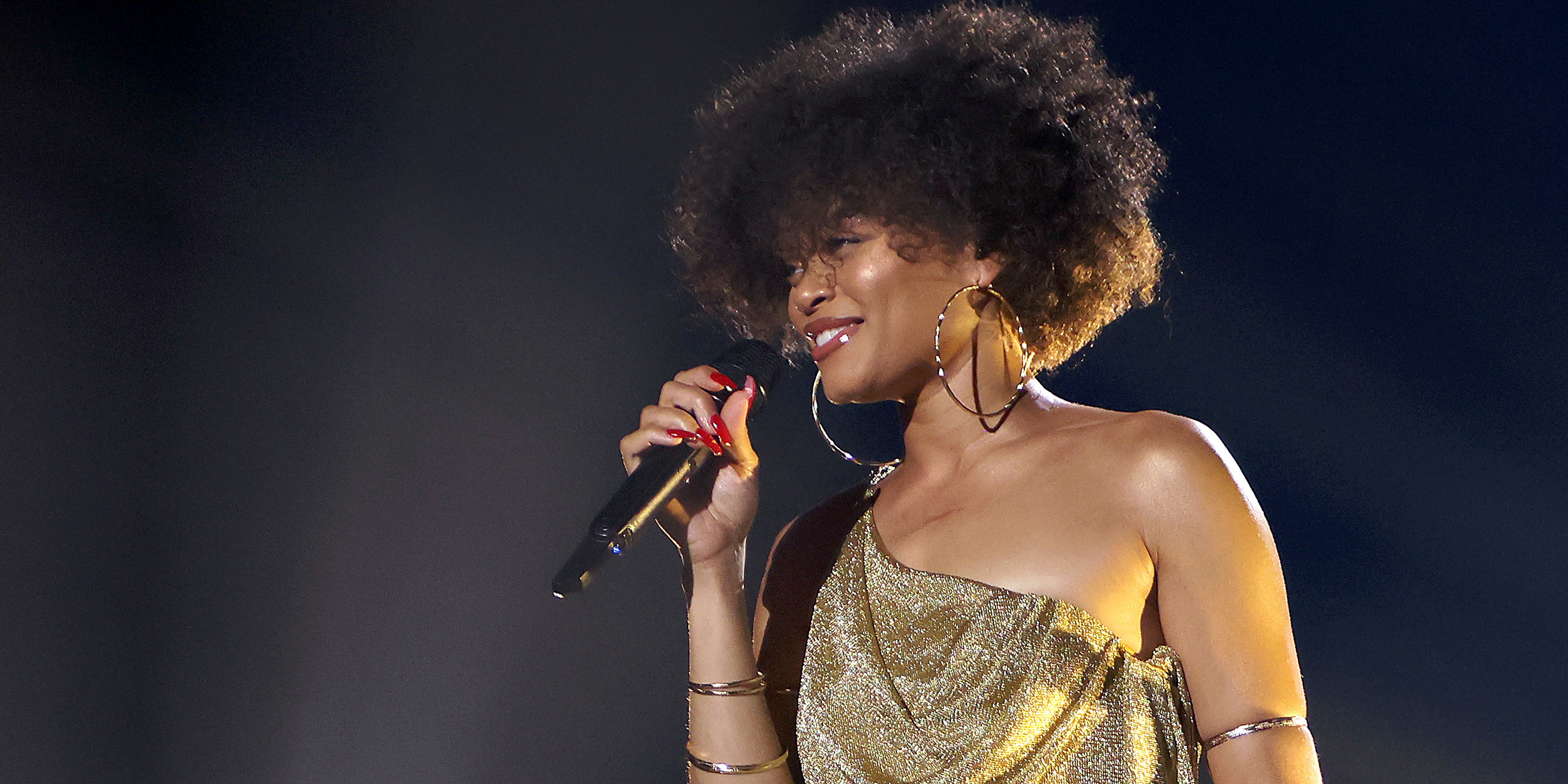 Andra Day Wears Gold Dress With Leg Slit to Essence Awards | PS Fashion