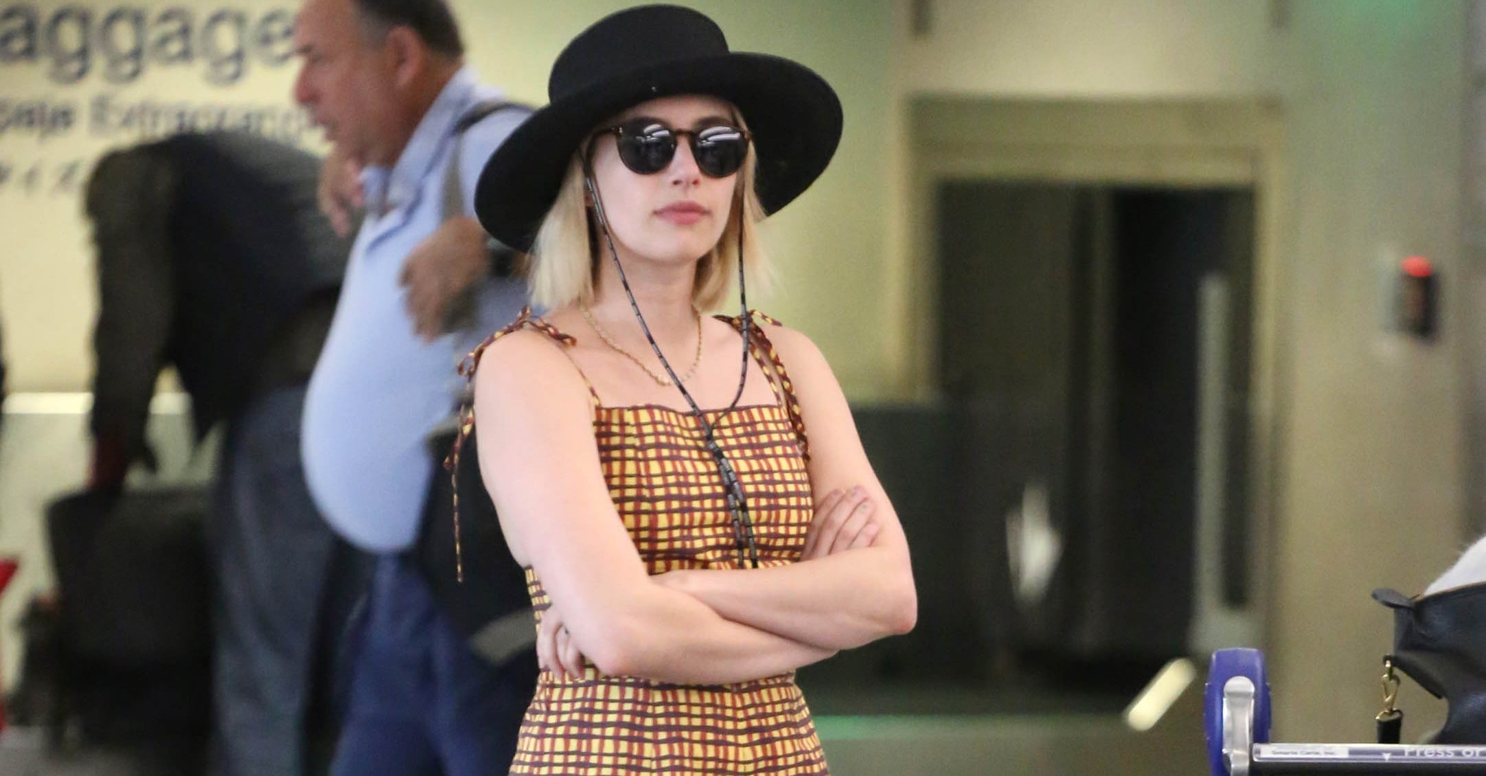 Emma Roberts Black Pearl Pumps in Airport | POPSUGAR Fashion
