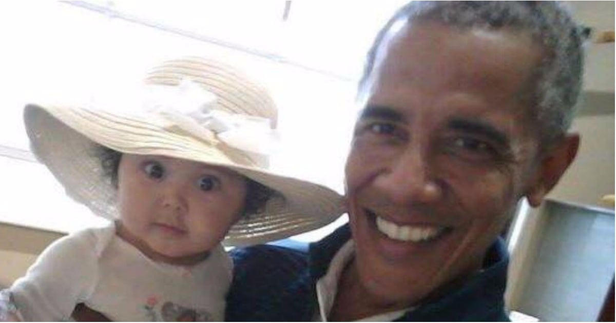 Barack Obama Holding Baby at Anchorage International Airport | POPSUGAR ...