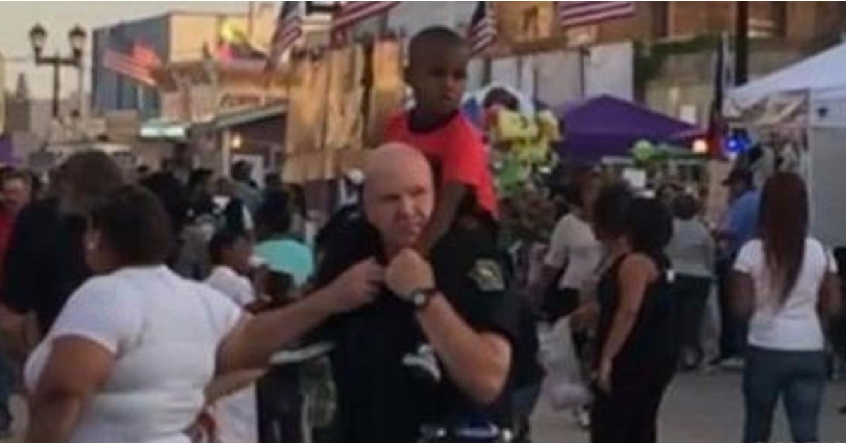 Cop Holding Lost Boy at Fair | POPSUGAR Family
