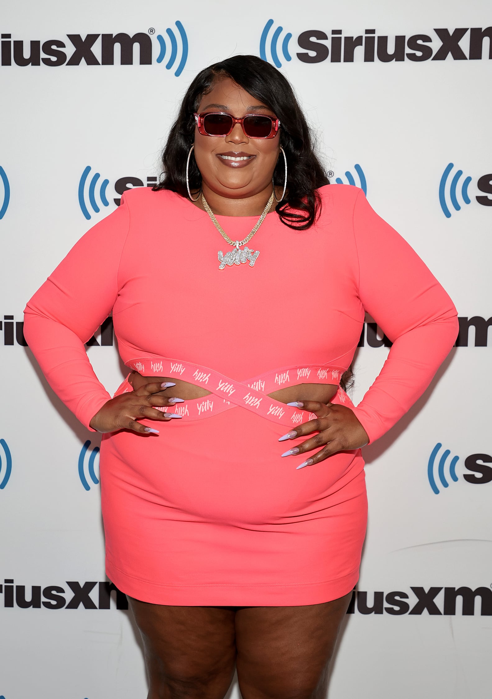 Lizzo Visits SiriusXM in a Pink Cutout Yitty Minidress | PS Fashion