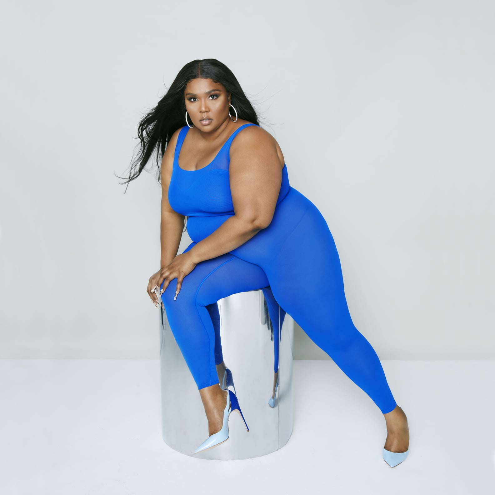 Lizzo Boards a Jet in Yitty Leggings With Butt Cutouts | PS Fashion