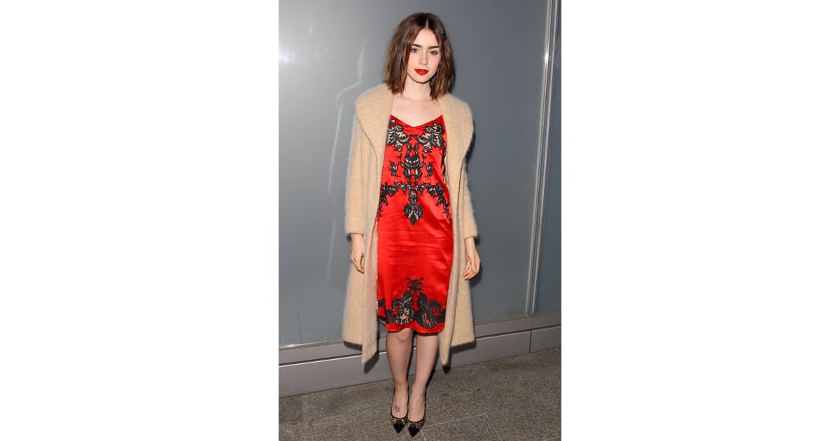 Lily Collins showed her sultry side in a red slip dress adorned with ... Lily Collins showed her sultry side in a red slip dress adorned with ...